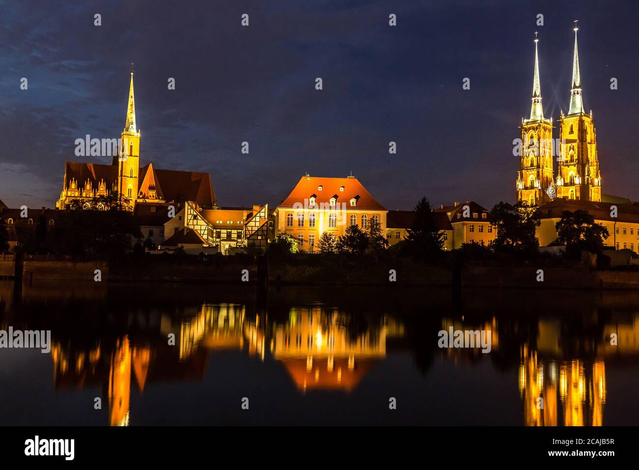 A cityscape cathedral, river Odra. Wroclaw, Poland, at dusk Stock Photo ...
