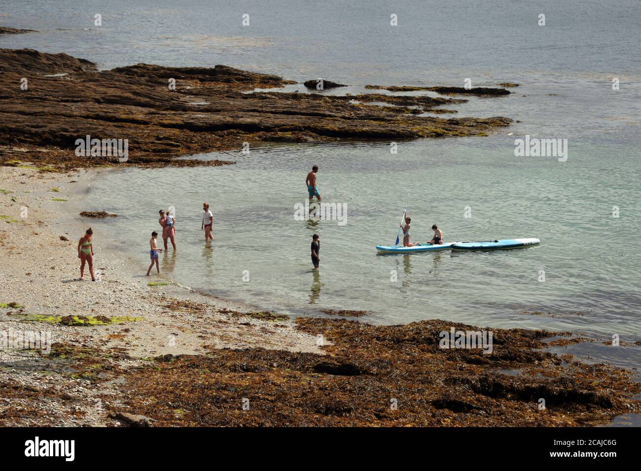 People on the beach at St Mawes, Cornwall, as the warm weather ...
