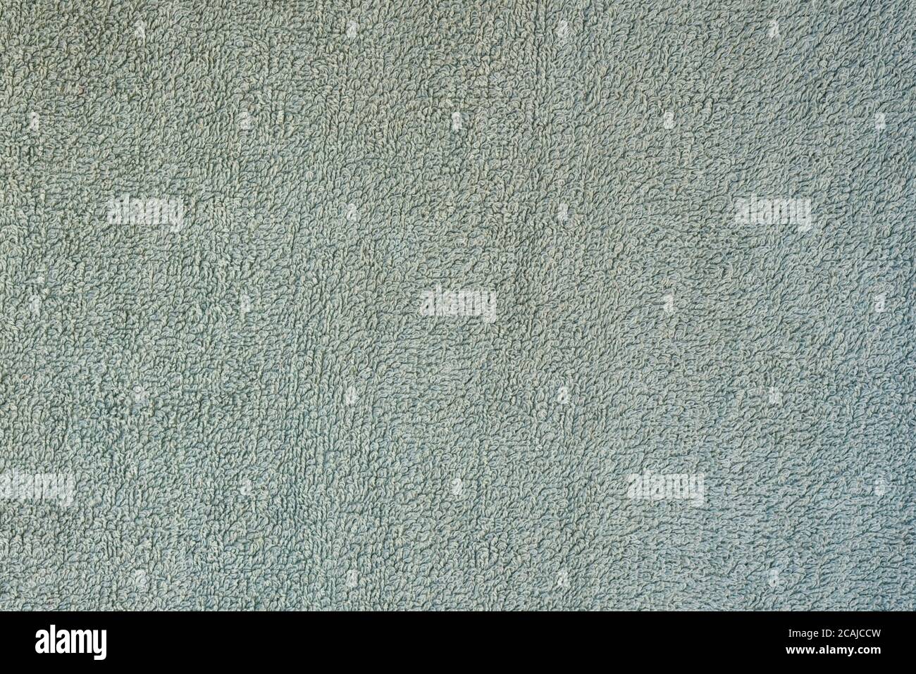 Smooth seamless texture of a terry towel. Turquoise color Stock Photo ...