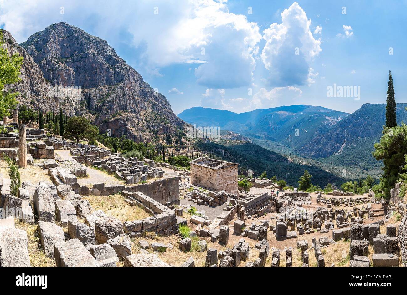 The Athenian treasury in Delphi, Greece in a summer day Stock Photo - Alamy