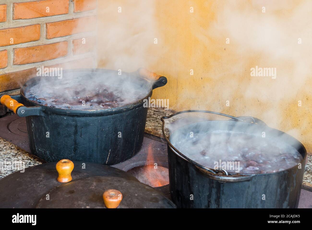 Old pot cooking over campfire hi-res stock photography and images - Alamy