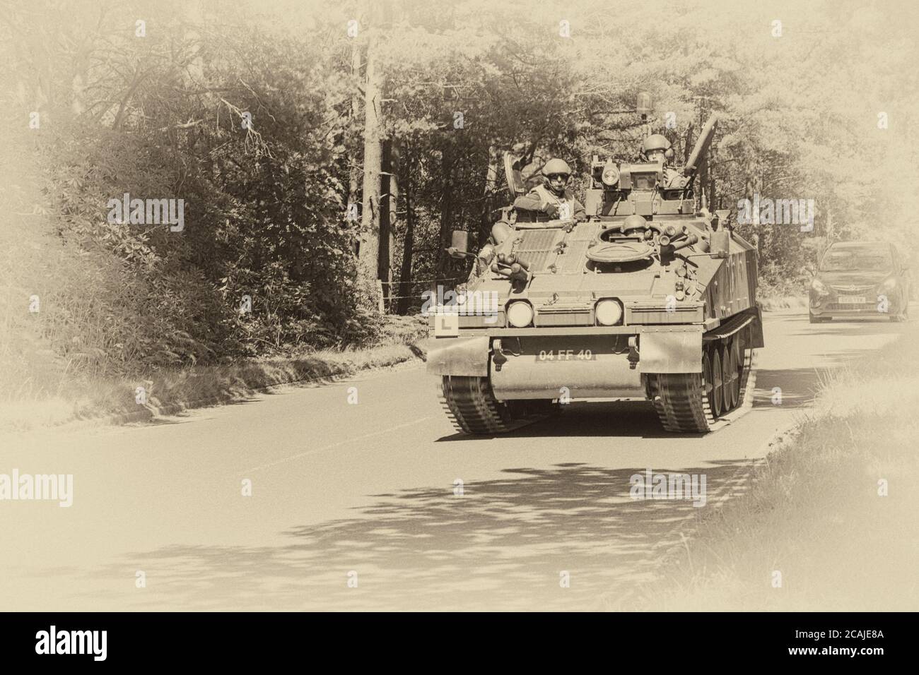 Spartan FV103 armoured vehicle with L plate learner driver, driving ...