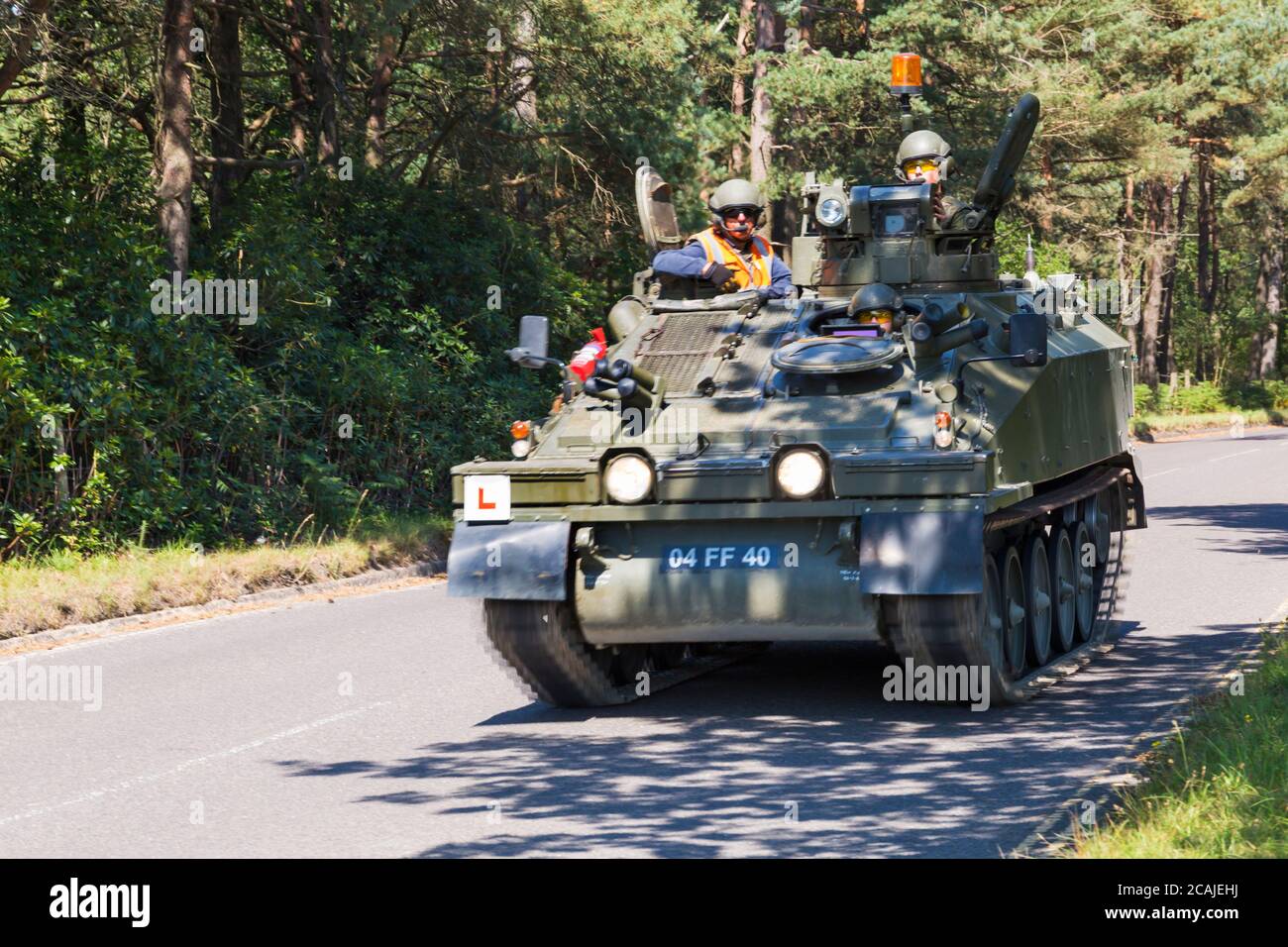 Spartan FV103 armoured vehicle with L plate learner driver, driving ...