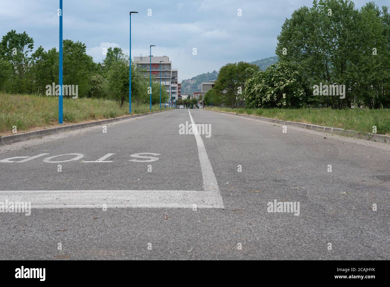 Stop sign written on the road hi-res stock photography and images - Alamy