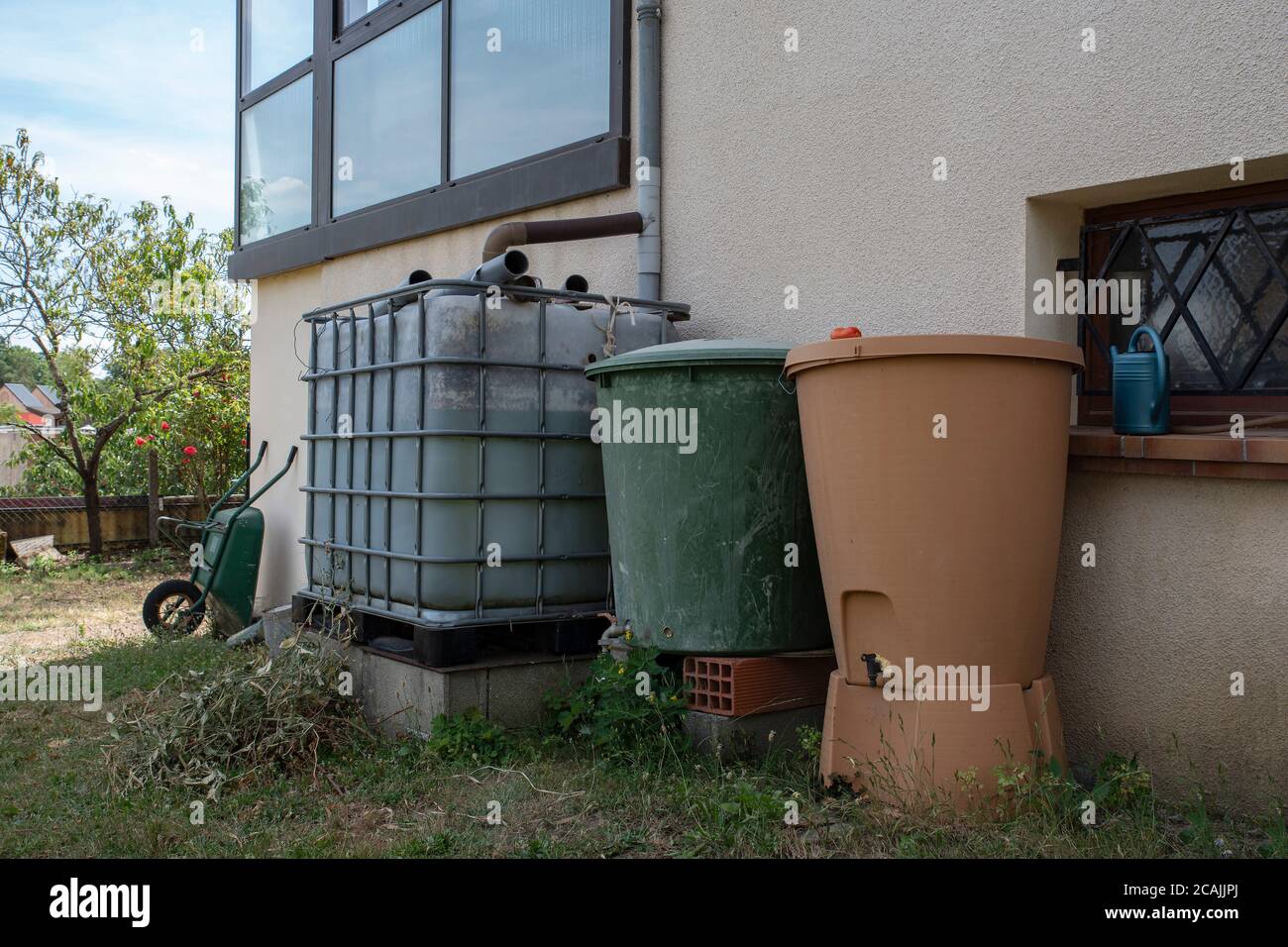 System for collecting rainwater through gutters for the garden Stock ...