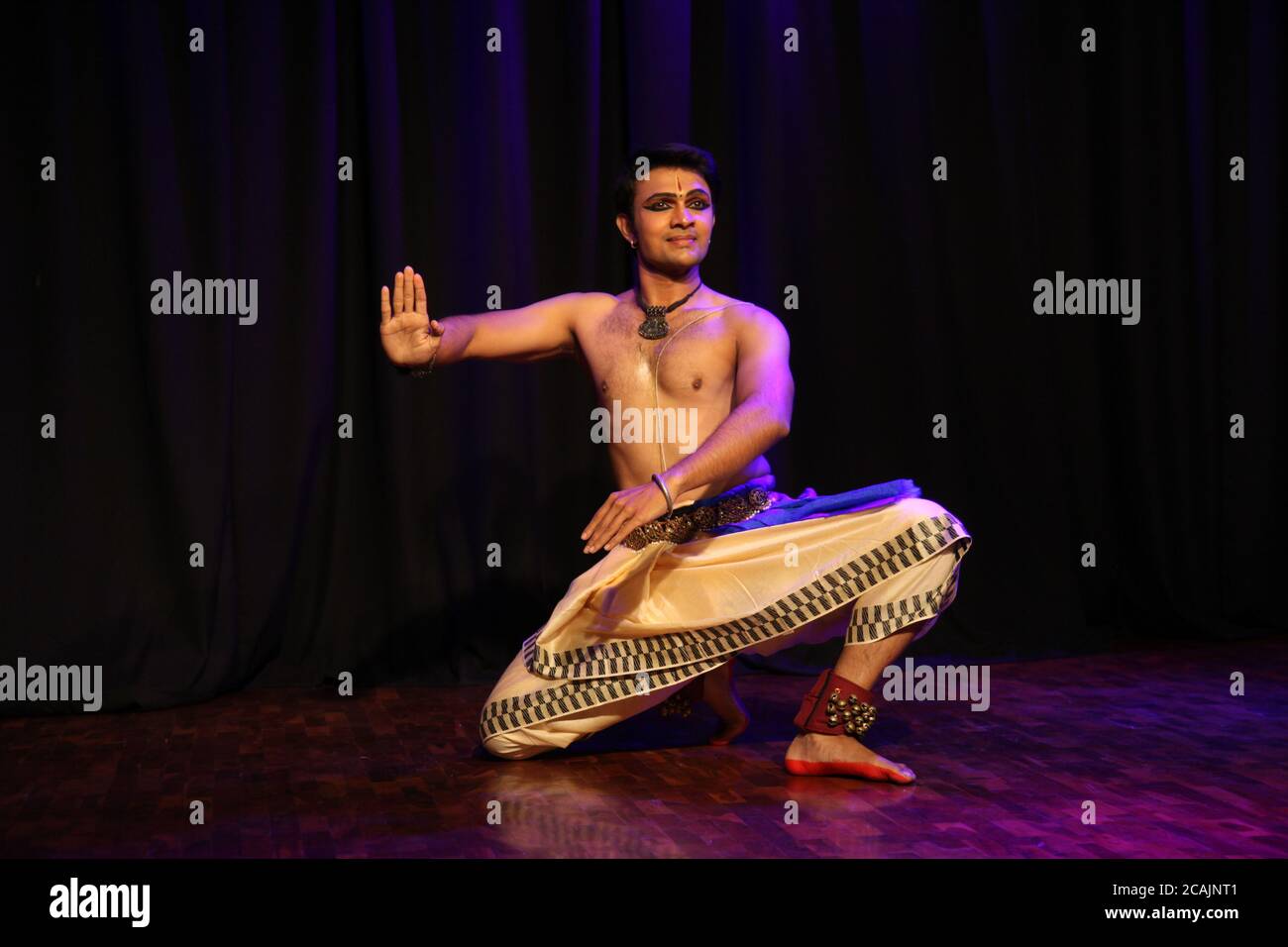 A male bharatnatyam dancer dances Stock Photo - Alamy