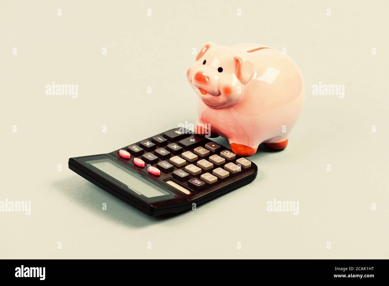 moneybox with calculator. Piggy bank. planning and counting budget ...
