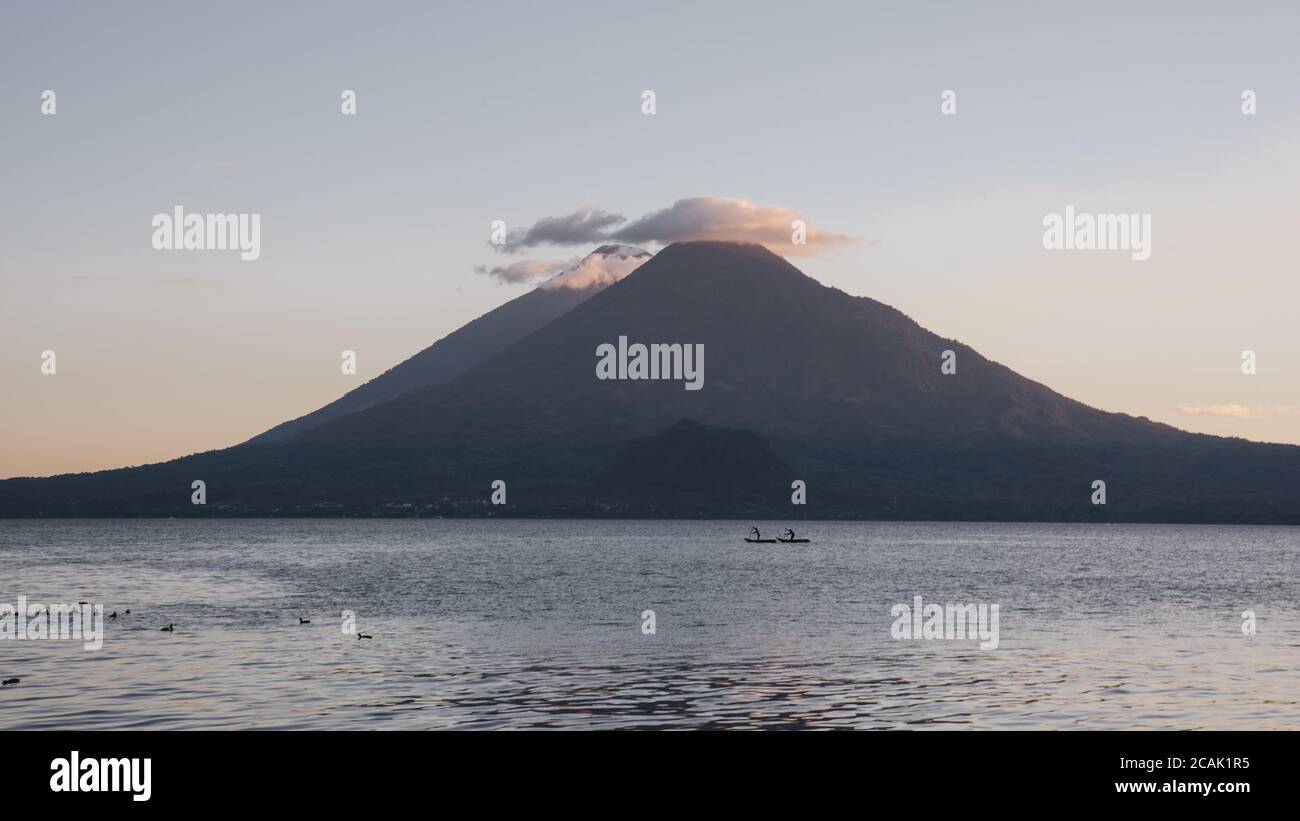Beautiful view of Lake of Atitlan with blue sky, clear water, cloudy ...