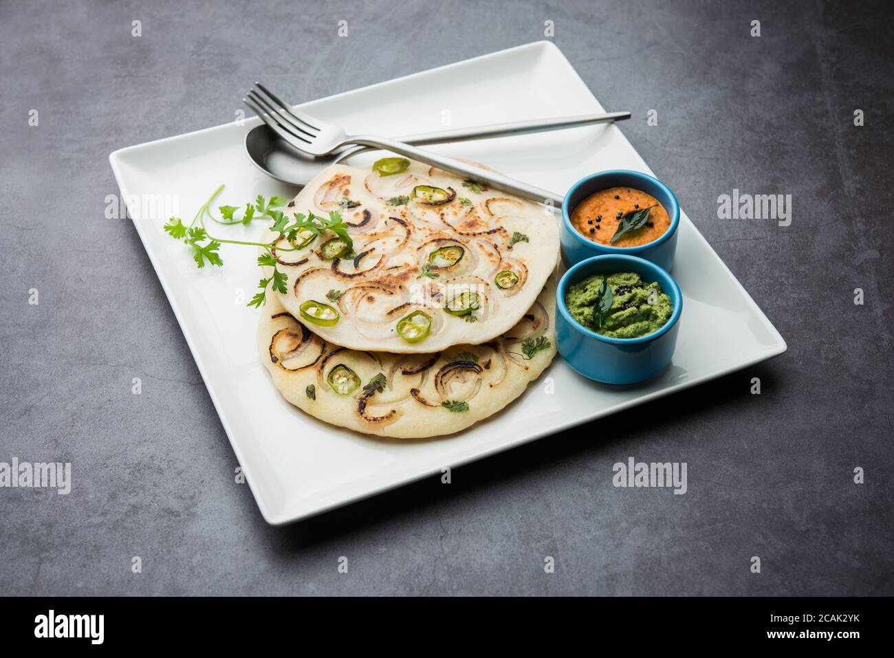 Uthappam or uttapam is a type of dosa from South India which is thicker ...