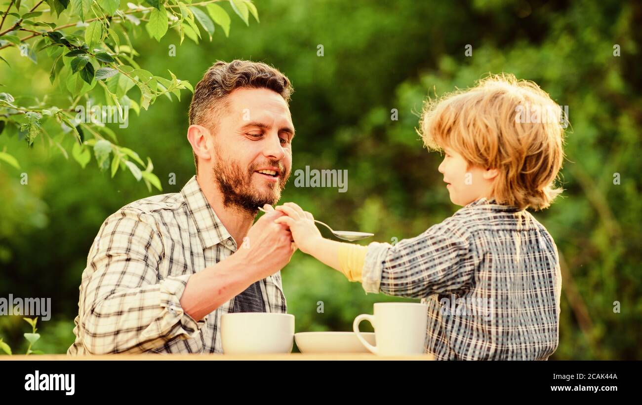 Natural nutrition concept. Feeding son natural foods. Stage of ...