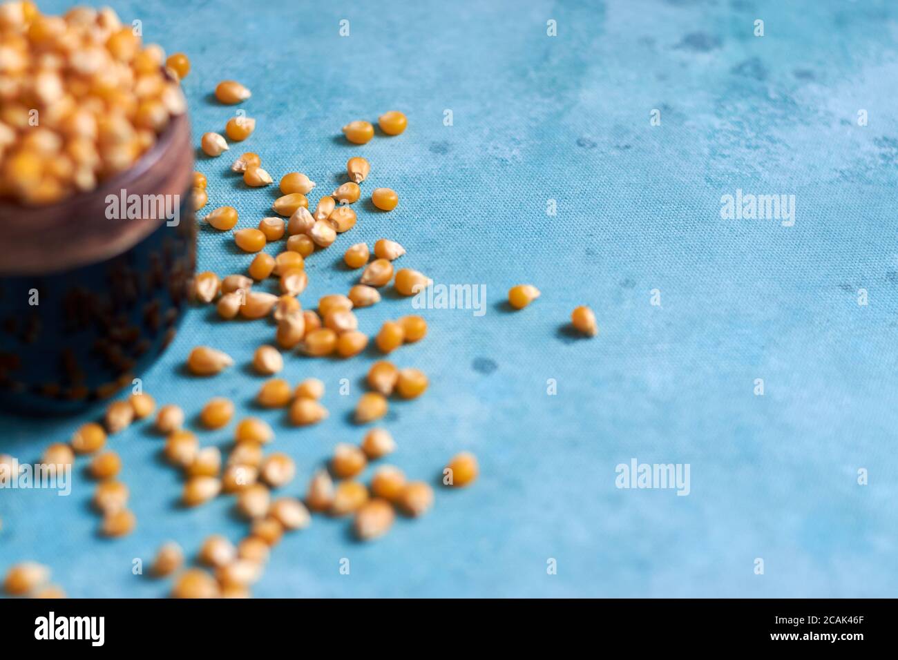 Selective focus closeup shot of scattered corn kernels fallen from a ...