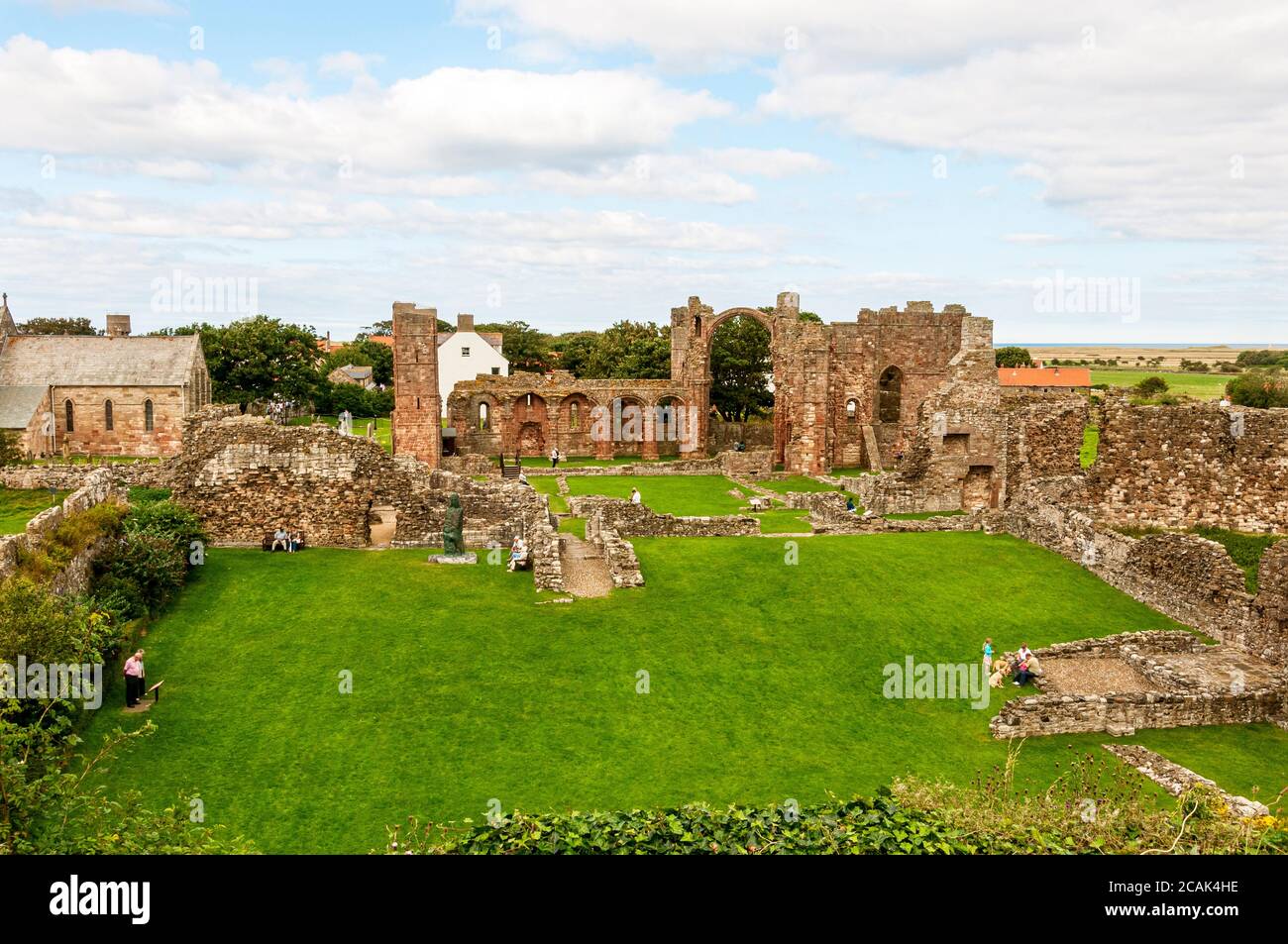 The extensive ruins of Lindisfarne Priory containing the medieval ...