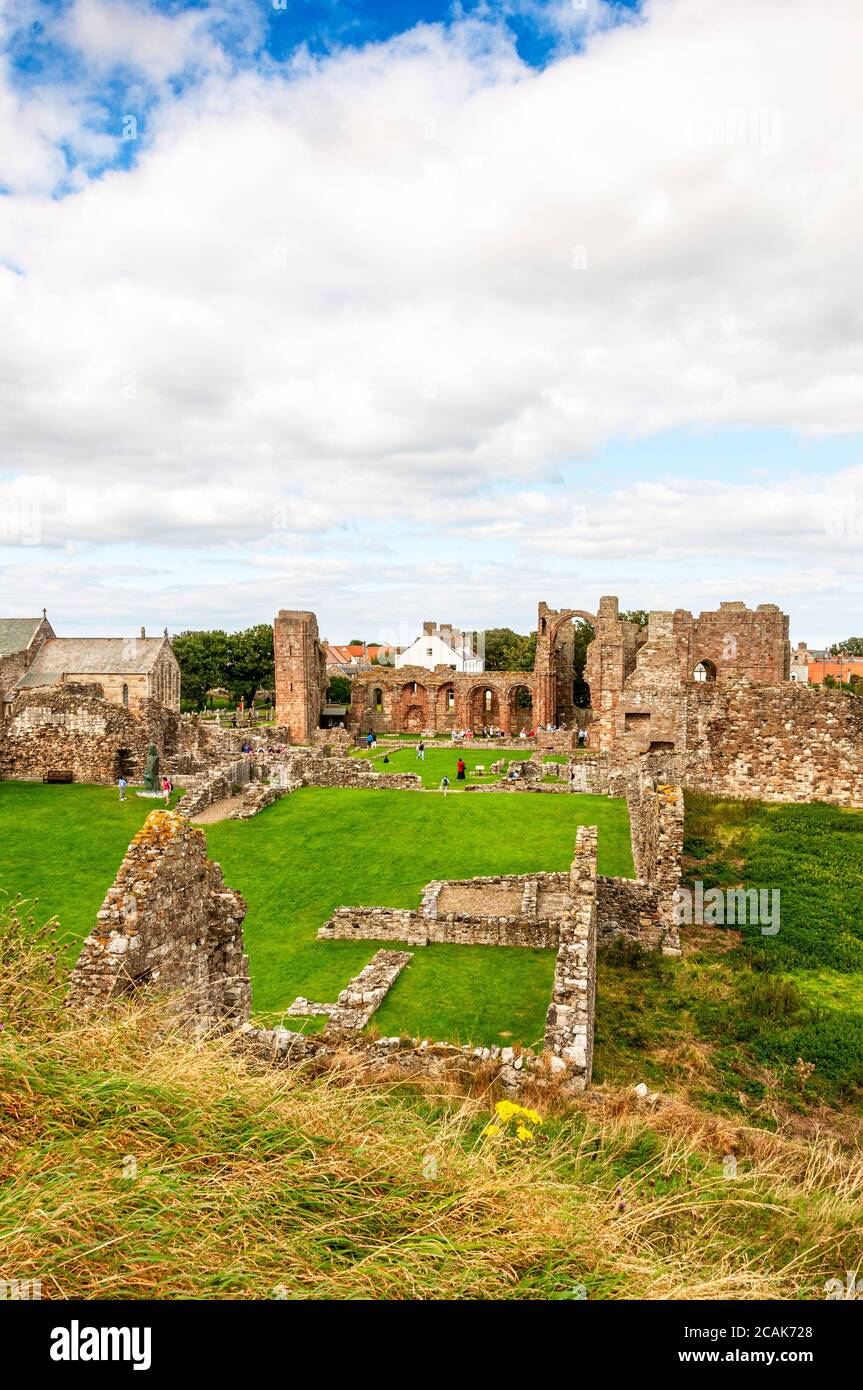The extensive ruins of Lindisfarne Priory containing the medieval ...