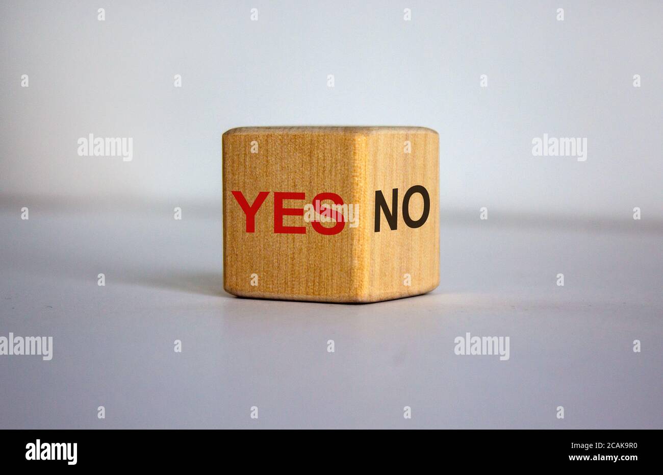 Wood block with words 'yes' and 'no' on beautiful white background ...