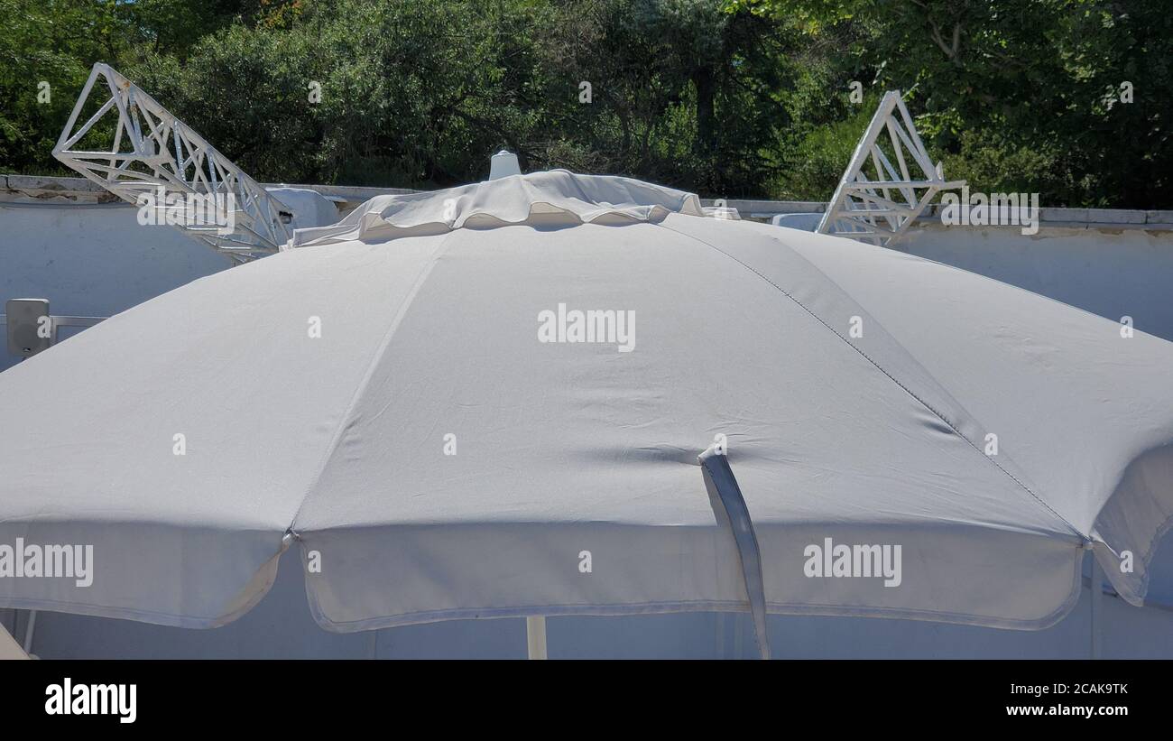 Big green umbrella hi-res stock photography and images - Alamy