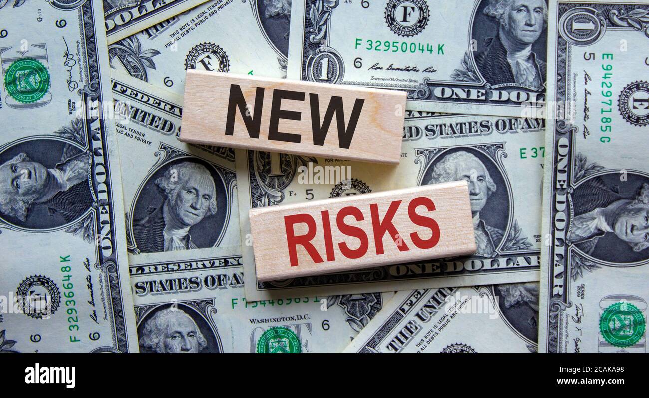 Concept words 'new risks' on wooden blocks on a beautiful background ...