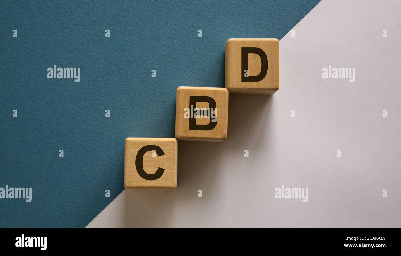 Wood block with acronym 'CBD' - 'customer business development ...