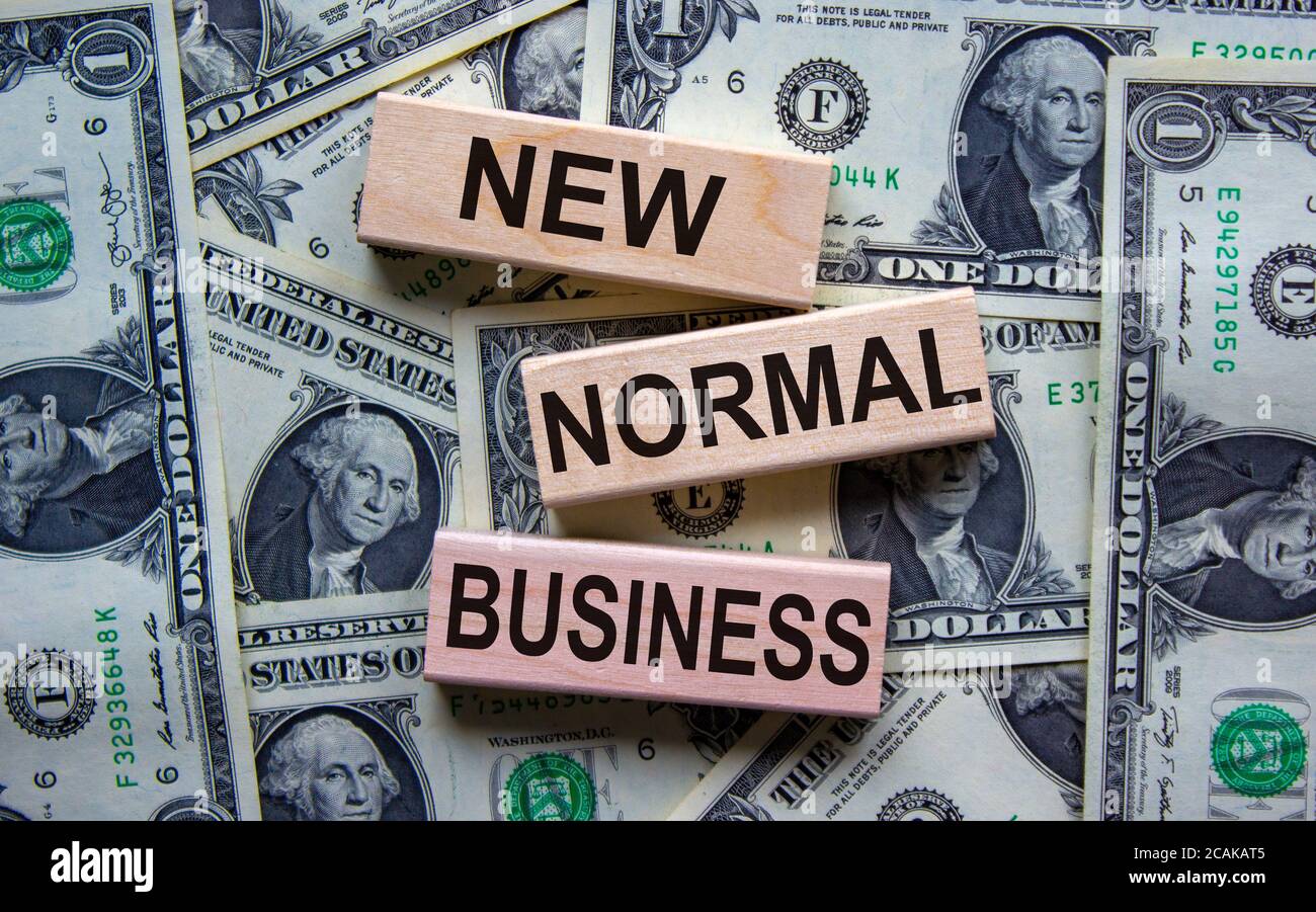 Concept text 'new normal business' on wooden blocks on a beautiful ...