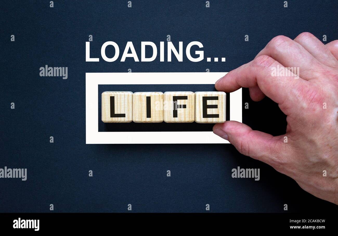 Loading word 'life' with hand putting wood cube in progress bar ...