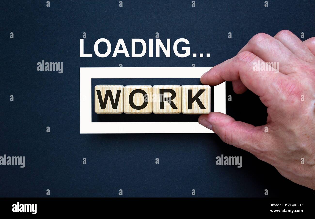 Loading word 'work' with hand putting wood cube in progress bar ...