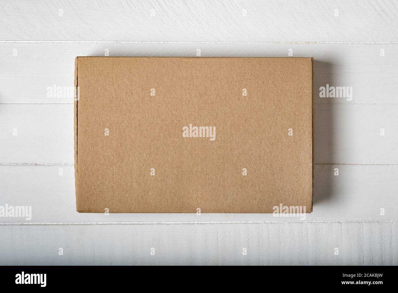 Rectangular carton box on white background. Design space Stock Photo ...