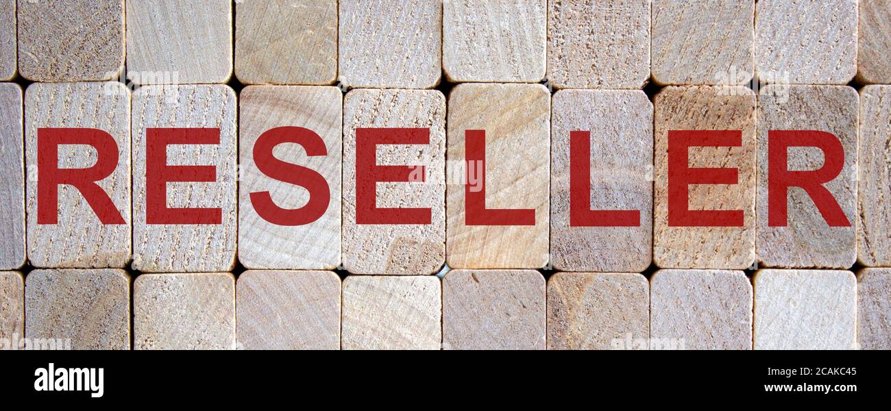 Wooden blocks form the word 'reseller'. Beautiful wooden background ...