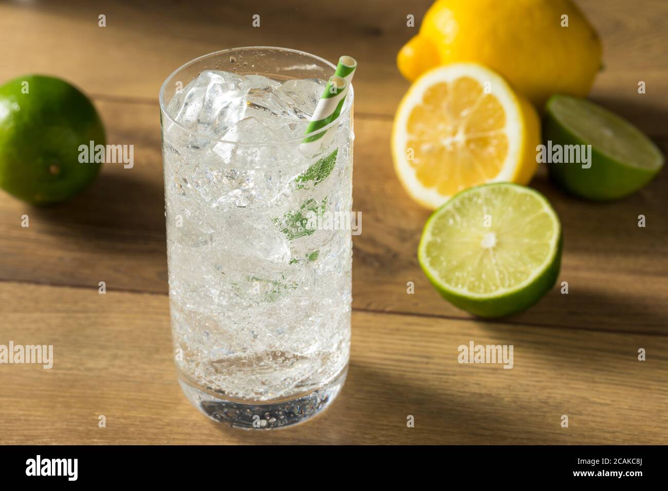 Refreshing Cold Lemon Lime Soda with a Straw Stock Photo - Alamy