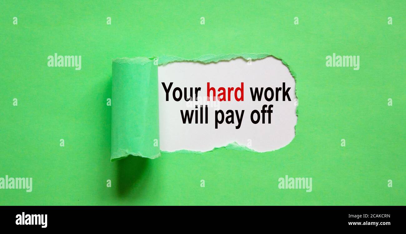The text 'your hard work will pay off' appearing behind torn green ...