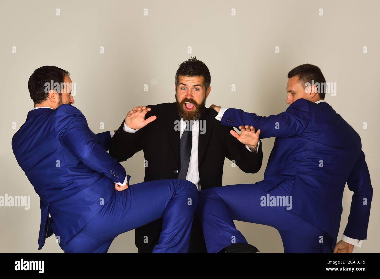 Argument and competition concept. Men with beard and astonished faces ...