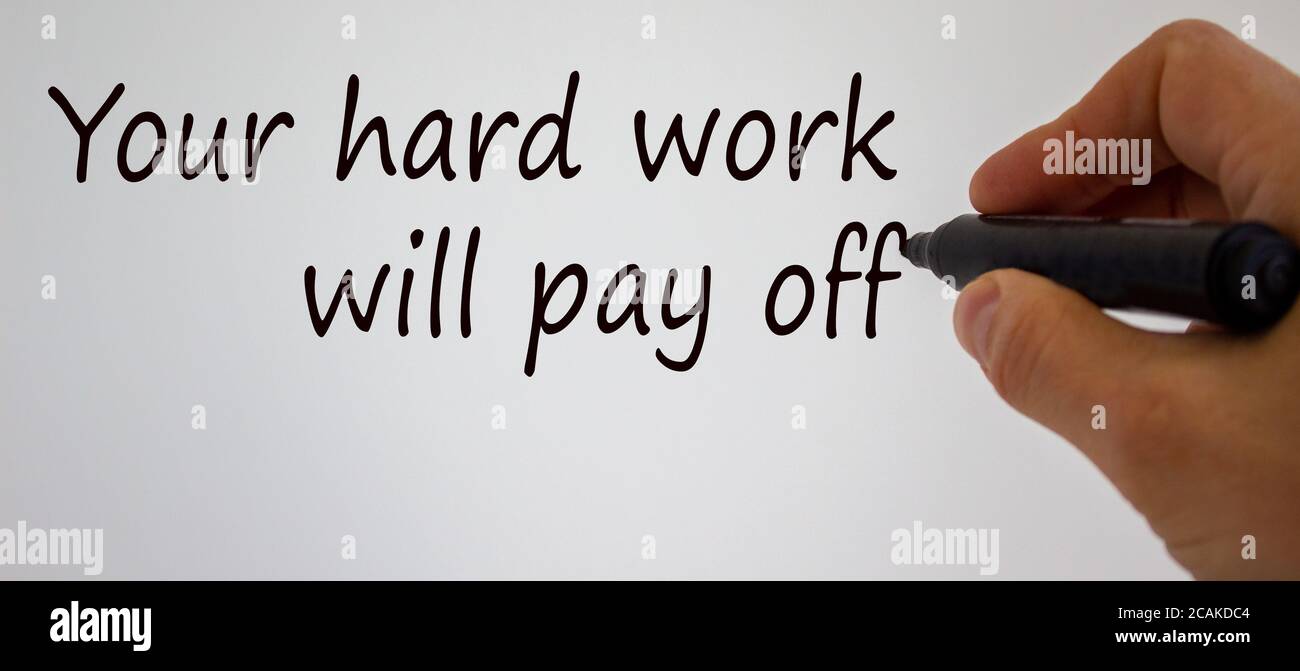 Hand writing 'your hard work will pay off', isolated on beautiful white ...