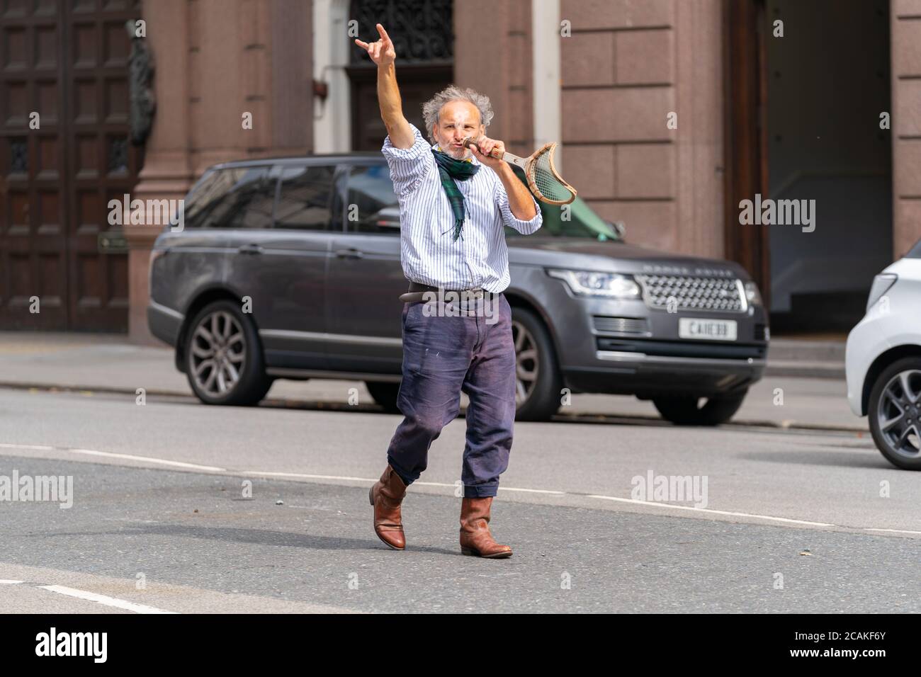 Eccentric busker hi-res stock photography and images - Alamy