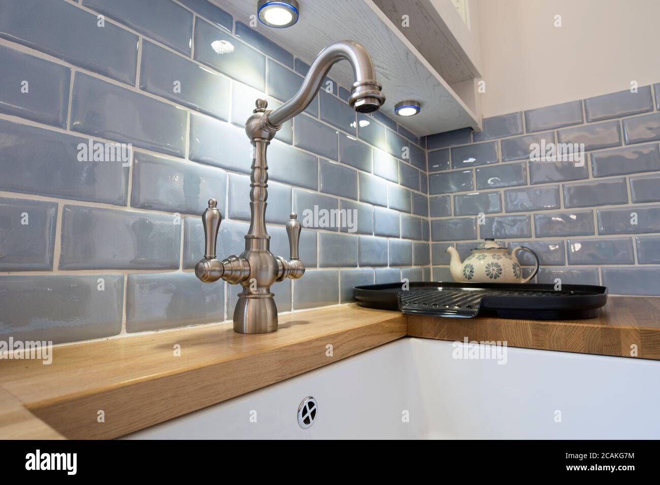 Modern kitchen sink and tap Stock Photo - Alamy