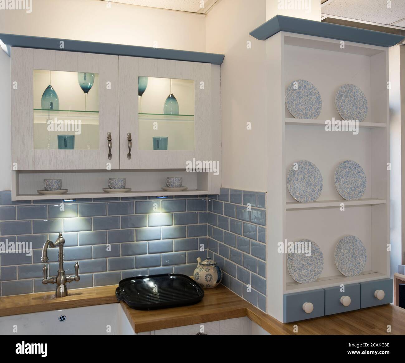 Modern kitchen sink and wall cabinets Stock Photo - Alamy