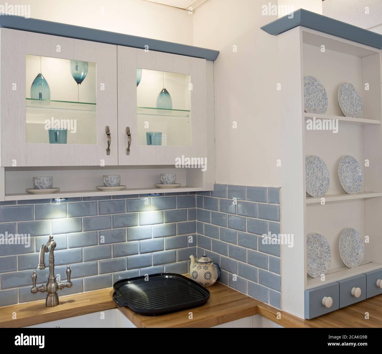 Modern kitchen sink and wall cabinets Stock Photo - Alamy