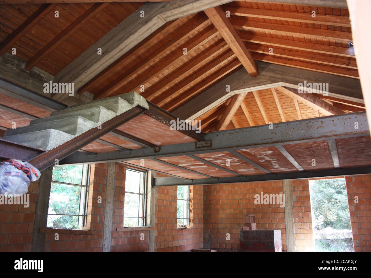 ceiling of a domestic residential house under construction with red ...