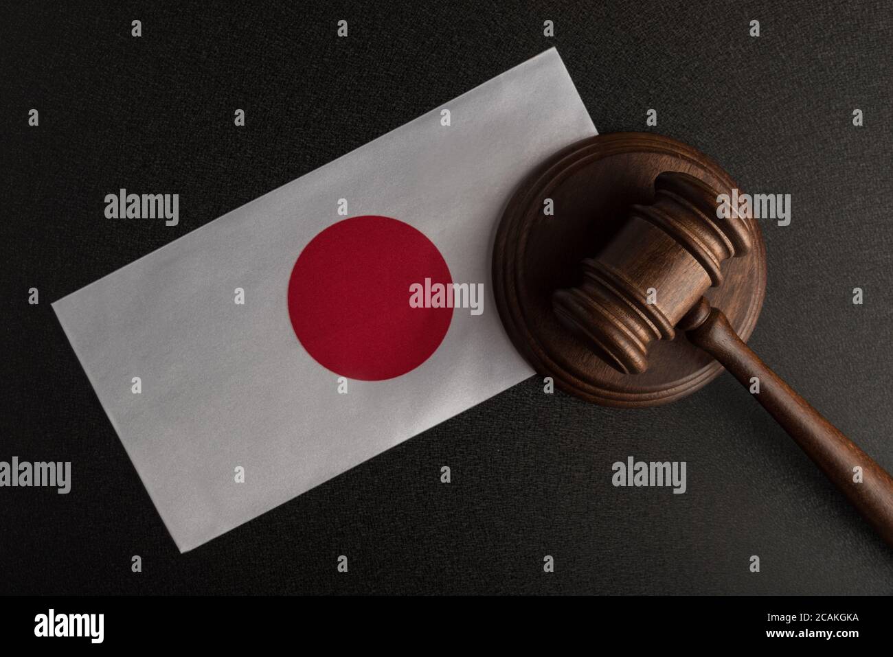judges hammer and flag of Japan. Law of Japan. Violation of rights ...