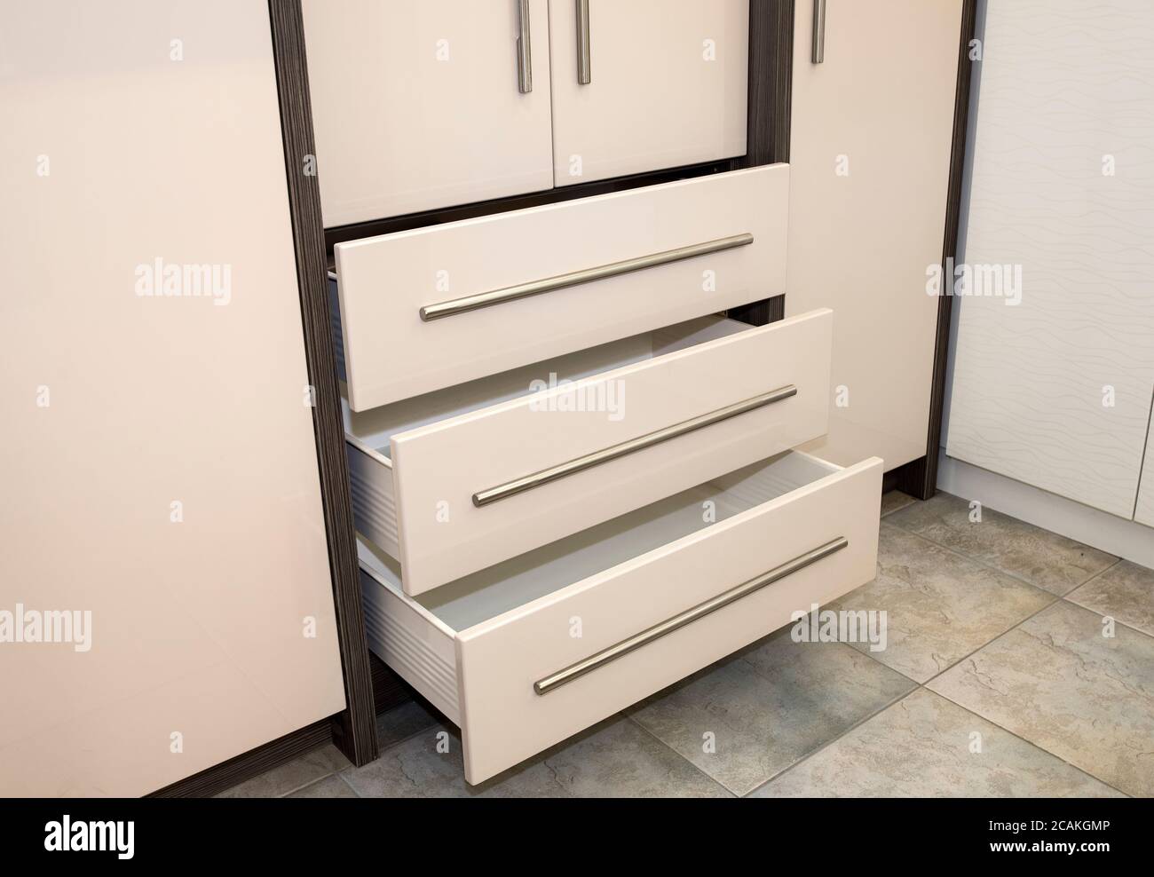 White open wardrobe draws Stock Photo - Alamy