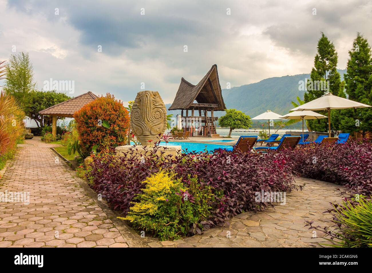 A Bataknese villa on the shore of Lake Toba, inside the volcanic crater ...