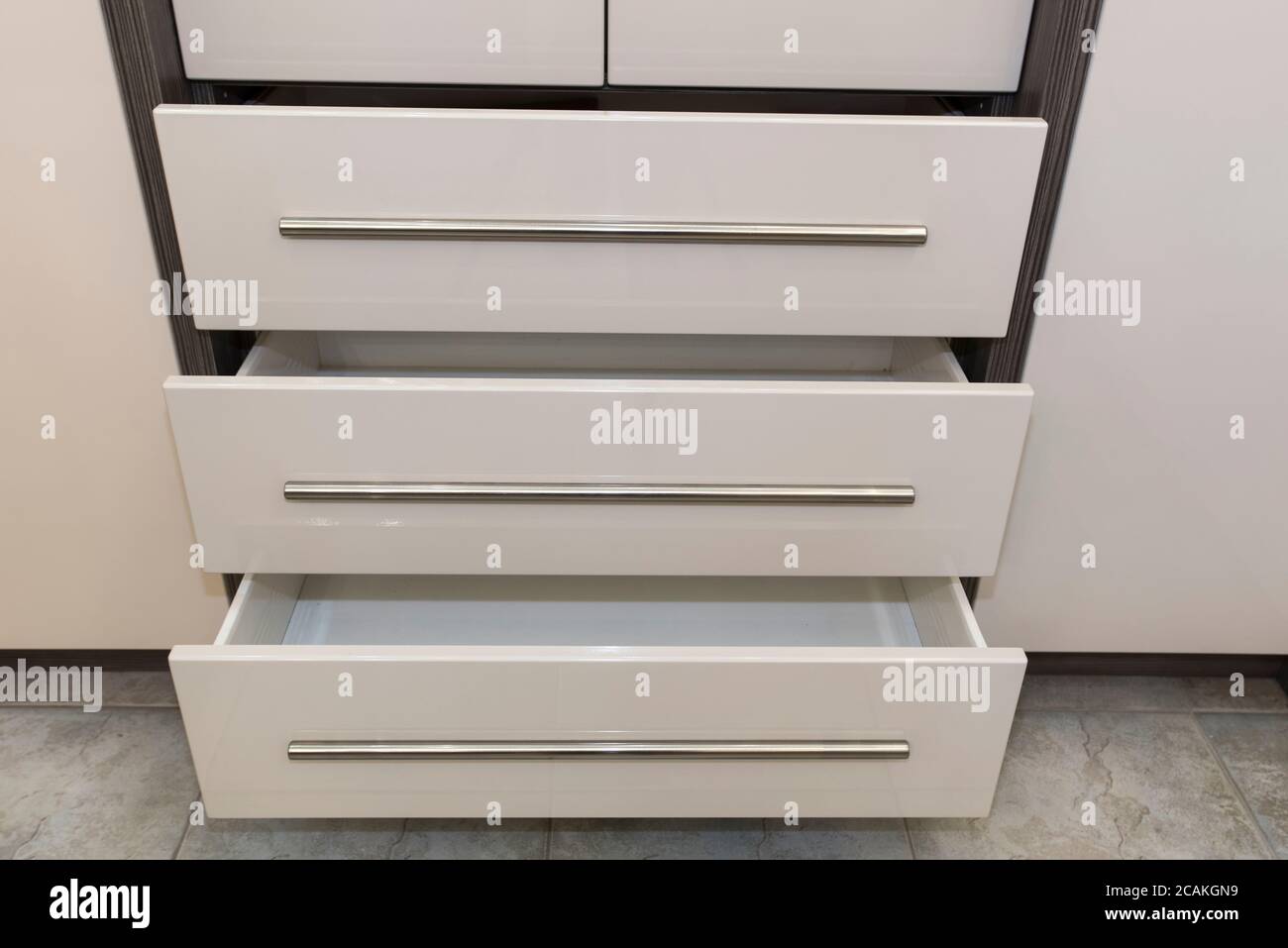 White open wardrobe draws Stock Photo - Alamy