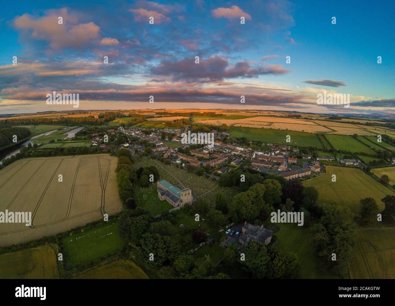 Norham village with its Norman castle and church next to the River ...