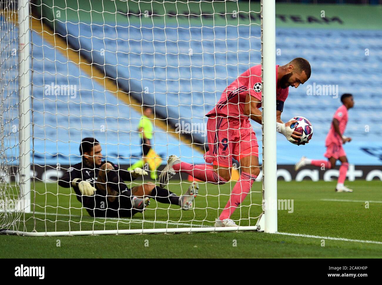 Real Madrid's Karim Benzema celebrates scoring his side's first goal of ...