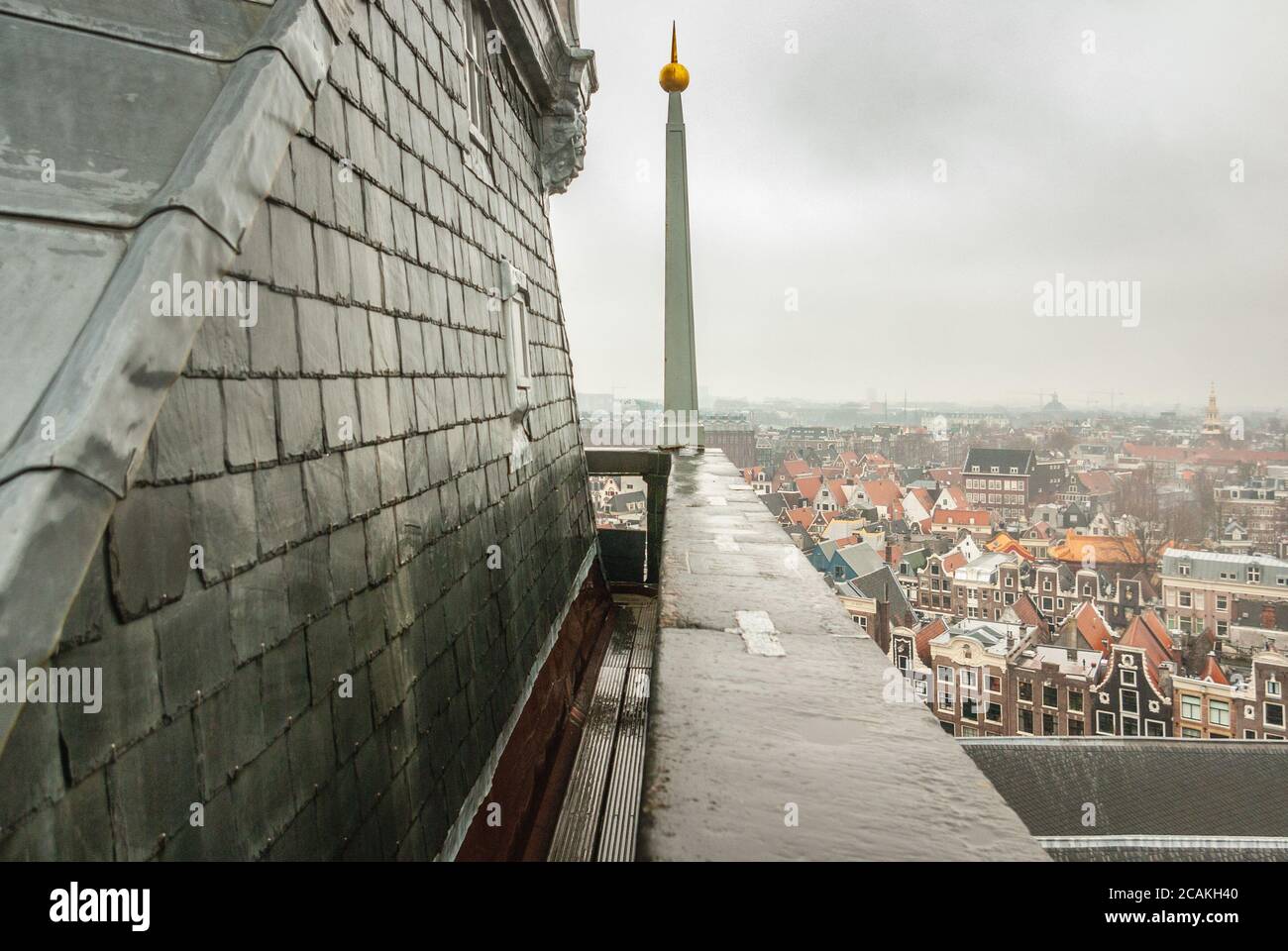 Golden lightning rod on the tower of the Oude Kerk (Old Church) and ...