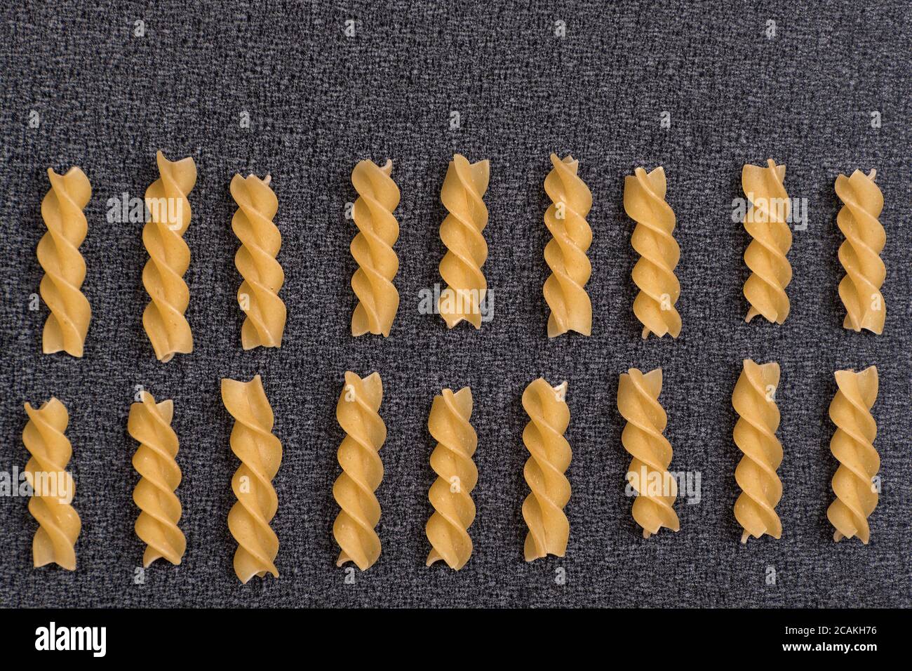 Fusilli close up. Pasta pattern background. Italian cuisine Stock Photo ...