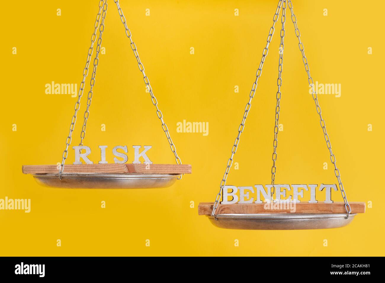 Risk vs benefit in balance. Concept of equilibrium. Balance scales on ...