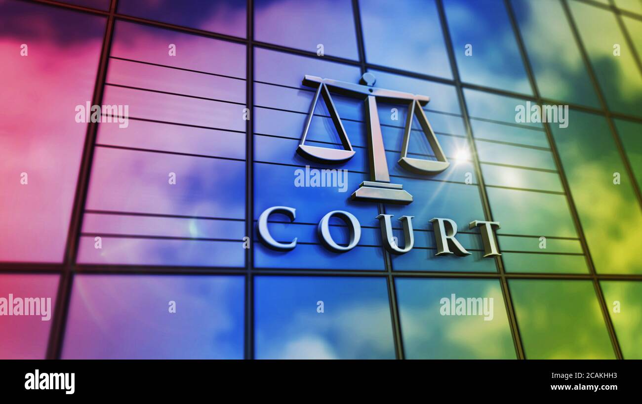 Court with a symbol of weight on glass building. Mirrored sky and city ...