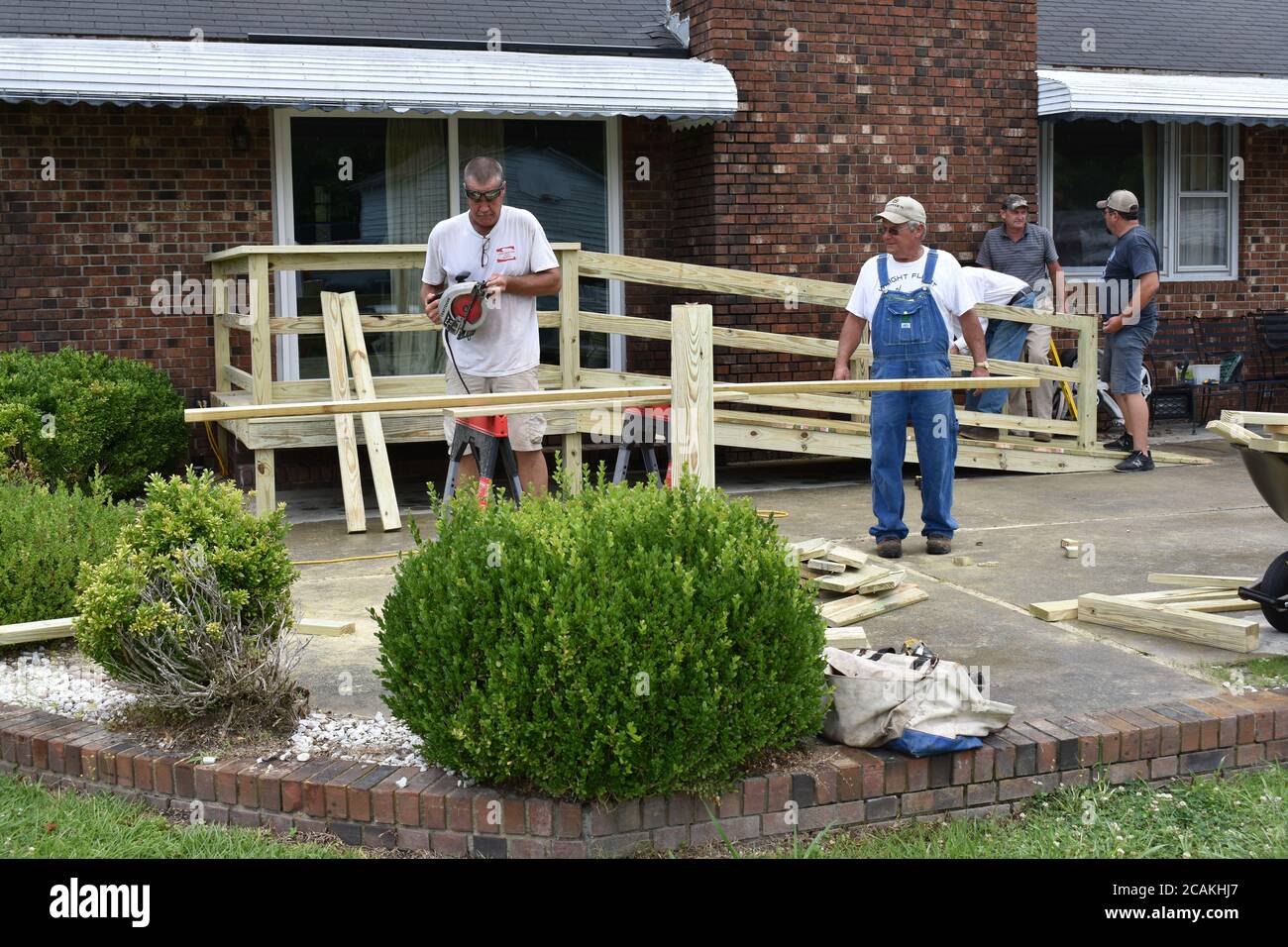 Construction of a Handicap Ramp to make the home wheelchair accessible ...
