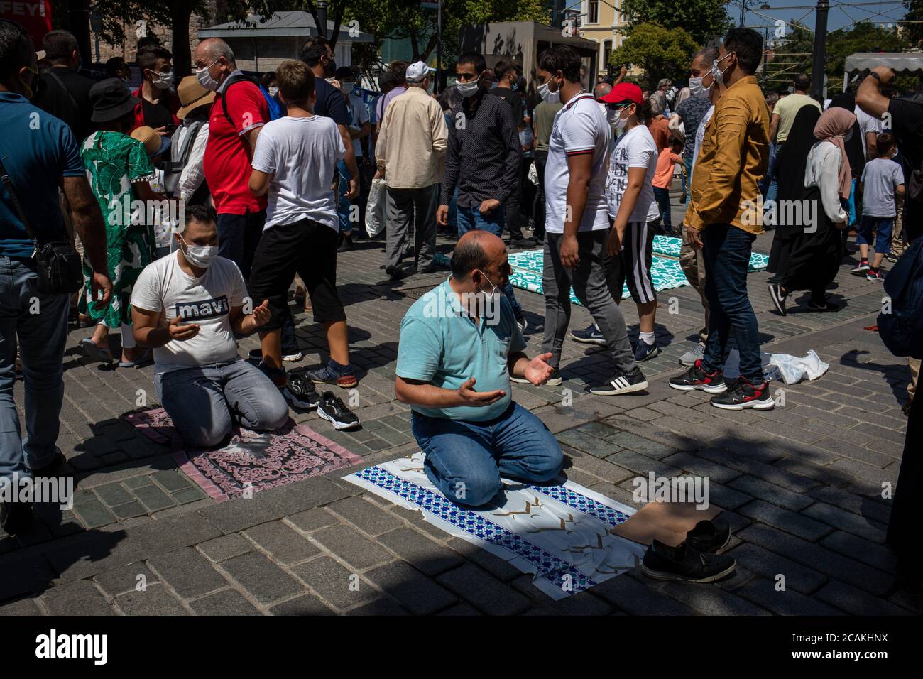 Muslims praying in Hagia Sophia Square. President and Justice and ...