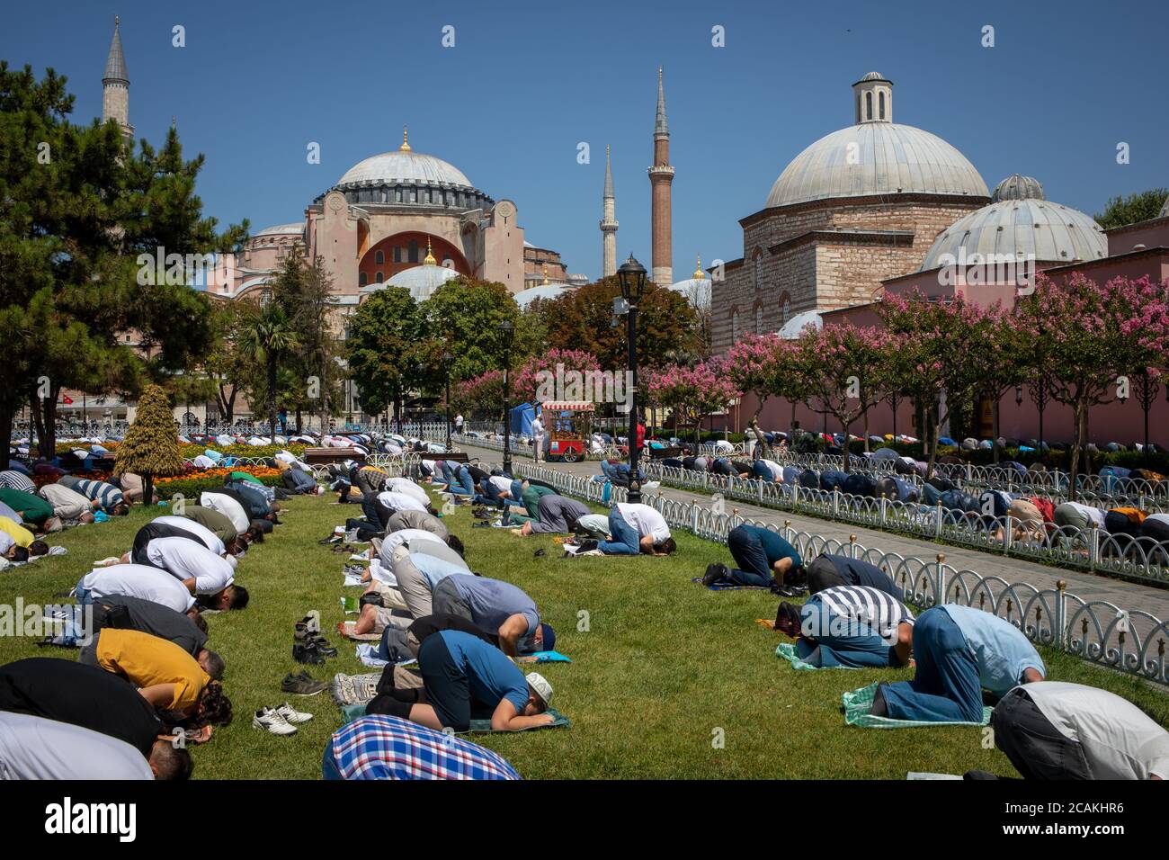 Muslims praying in Hagia Sophia Square. President and Justice and ...