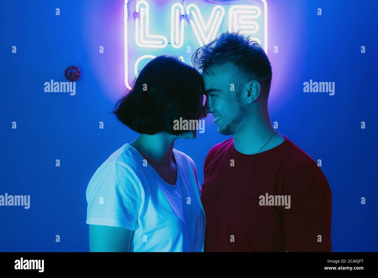 Couple in love in a cyber room. Dating in the online game.Photo with ...