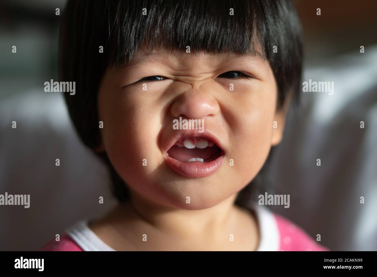 An adorable little girl Laughing and big smile in the morning. Concept ...